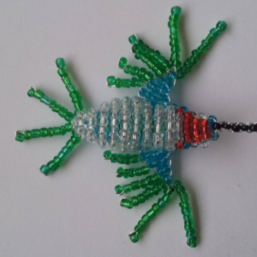 Colibri bleu et vert en perles de rocaille - Un grand marché